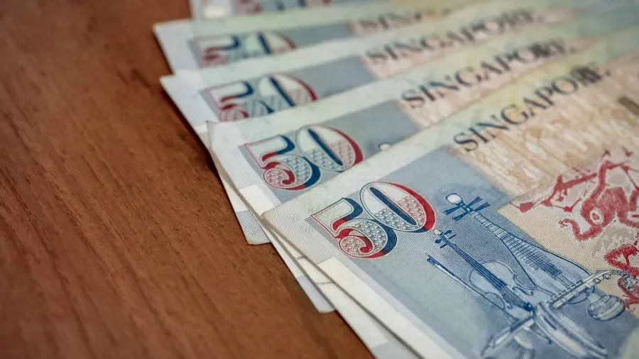 MAS tightens monetary policy as inflation outlook lifted to 2.5% cap ...