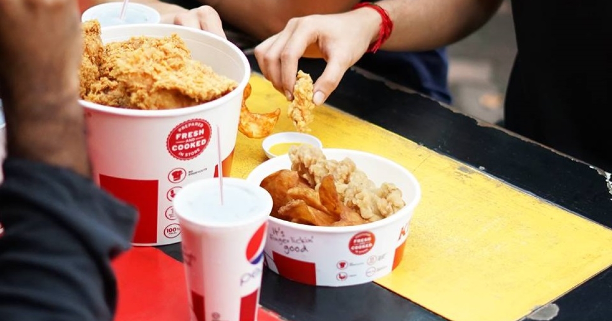 KFC Singapore delivers Hot Devil Drumlets to a lucky fan | QSR Media Asia